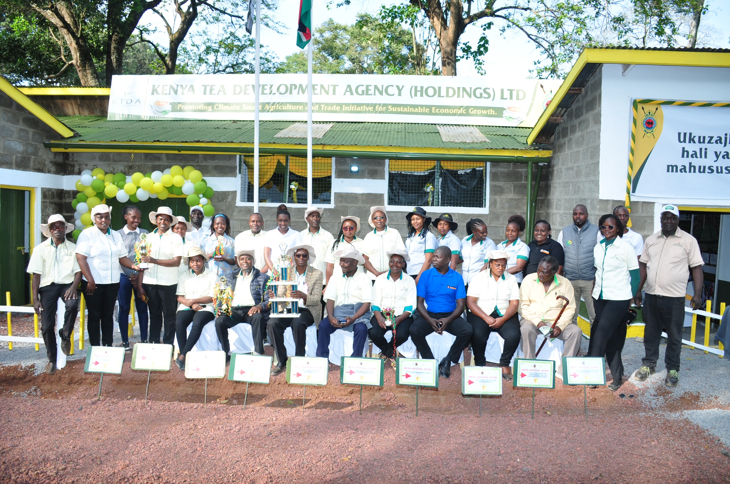 The KTDA team receives trophies from Meru Governor Kawira Mwangaza ...